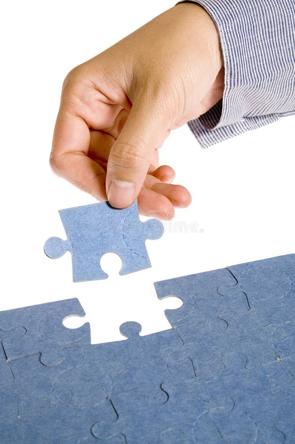 Finishing the Puzzle stock photo. Image of solution, inspiration - 20680728