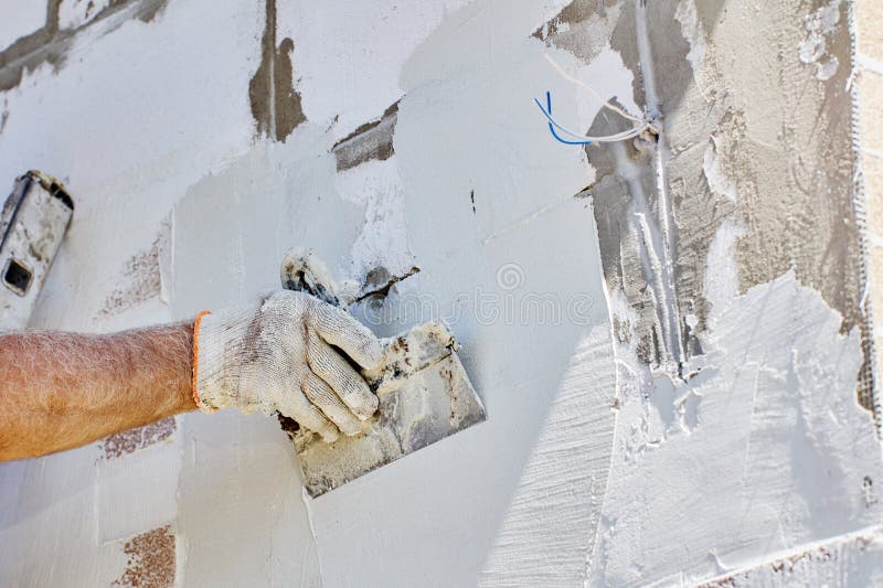 Finishing Work on Cladding of Facade of House, Construction Worker ...