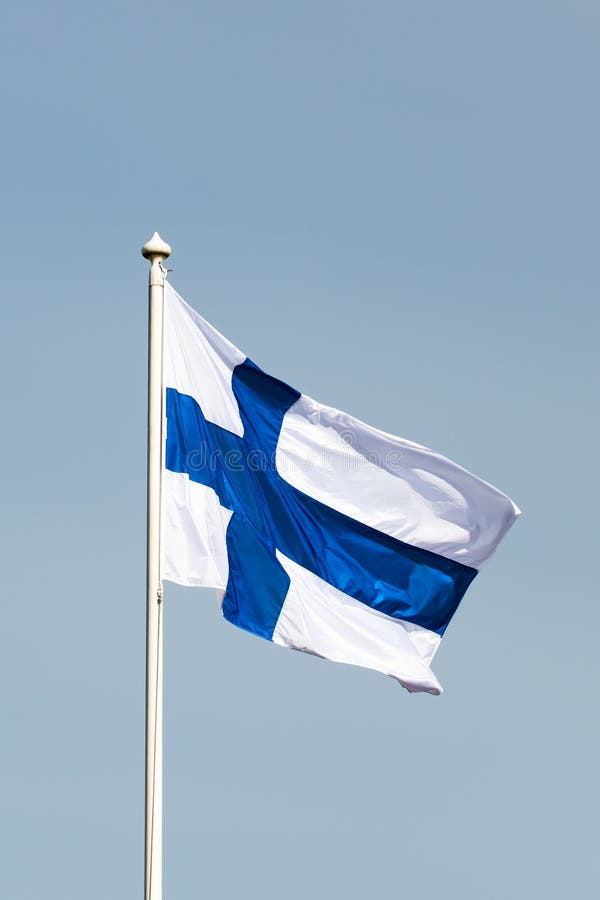 Finnish National Flag on the Wind Against the Blue Sky Stock Image ...