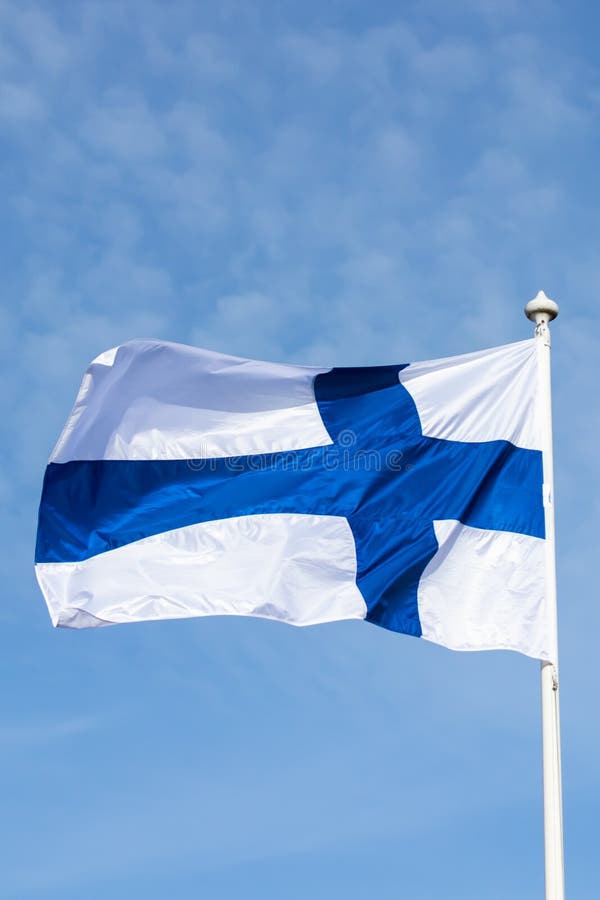 Finnish National Flag on the Wind Against the Blue Sky Stock Image ...