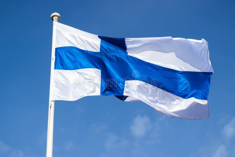 Finnish National Flag on the Wind Against the Blue Sky Stock Image ...