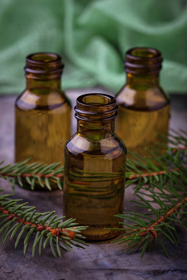 Fir Tree Essential Oil in Small Bottles Stock Photo - Image of ...