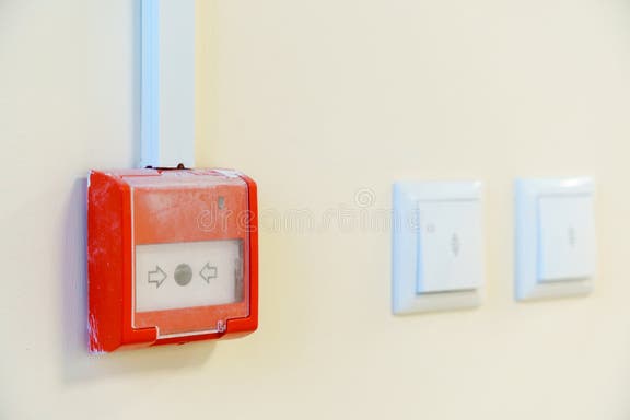 Fire Alarm and Light Switch on the Wall. Equipment for Fire ...