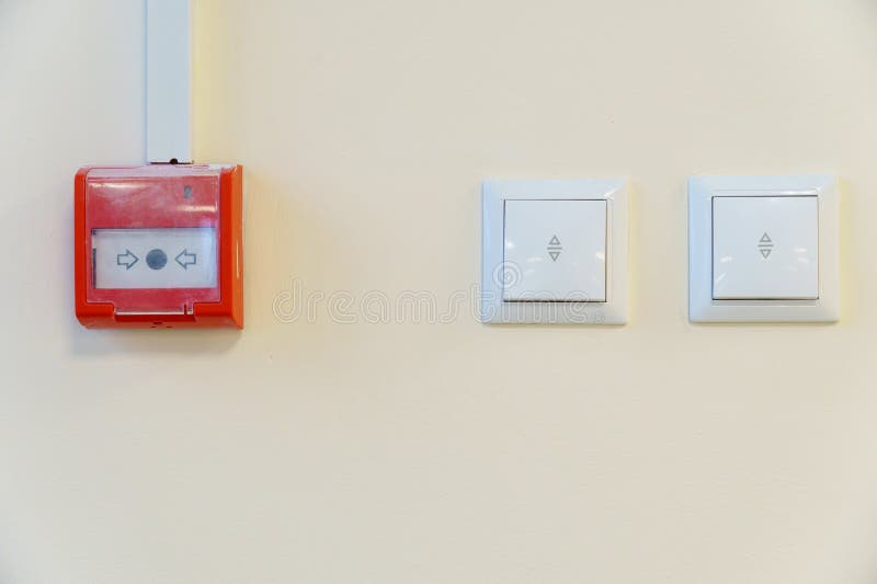 Fire Alarm and Light Switch on the Wall. Equipment for Fire ...