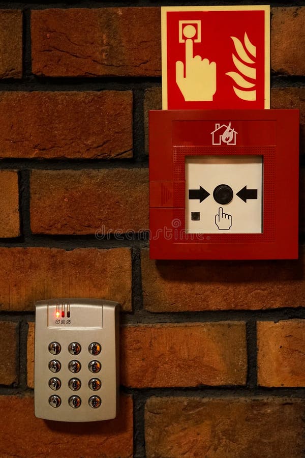 Fire Alarm and Security Keypad on a Brick Wall Stock Photo - Image of ...