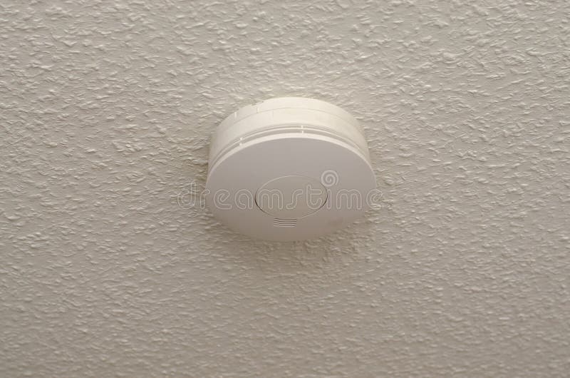 Fire Alarm Sensor on the Ceiling in the Living Room Stock Photo - Image ...