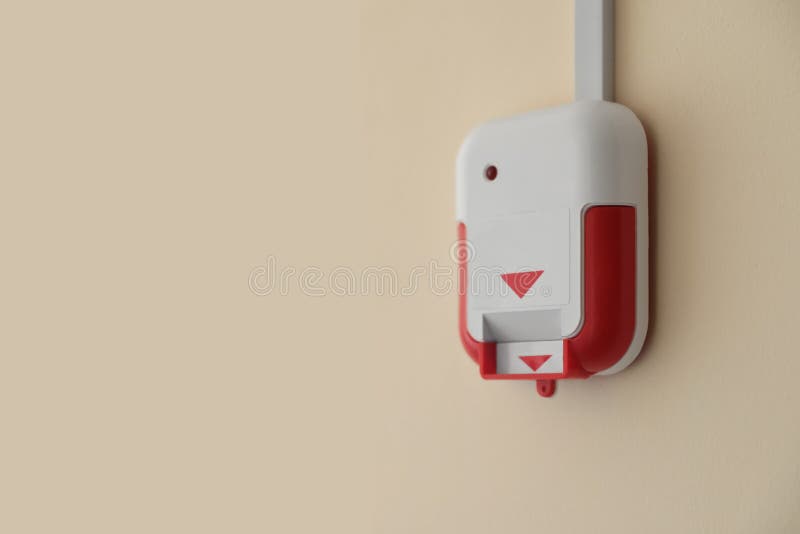 Fire Alarm Switch on Light Wall Indoors. Space for Text Stock Image ...