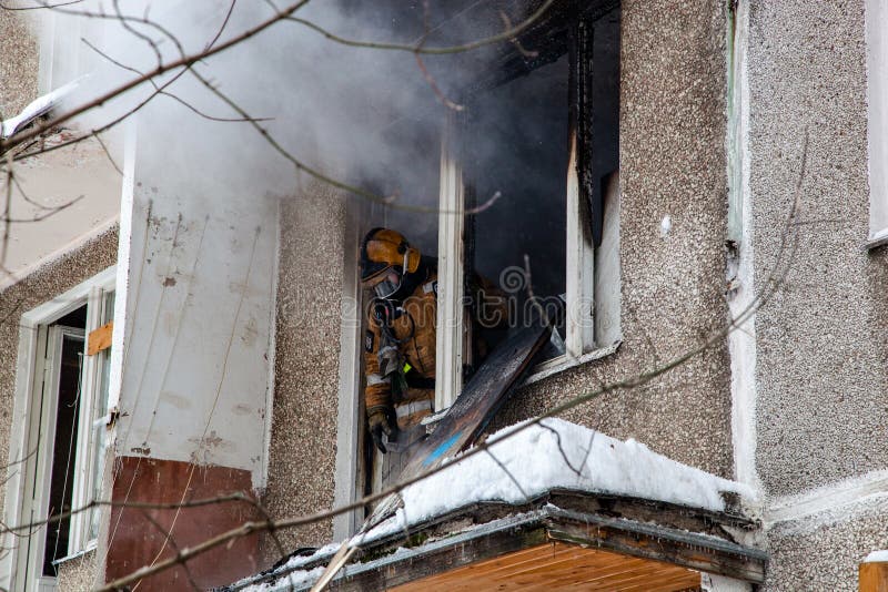 Fire in an Apartment Building, Firefighters Arrived in Fire Trucks and ...
