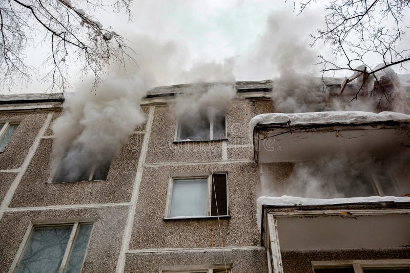 Fire in an Apartment Building, Firefighters Arrived in Fire Trucks and ...
