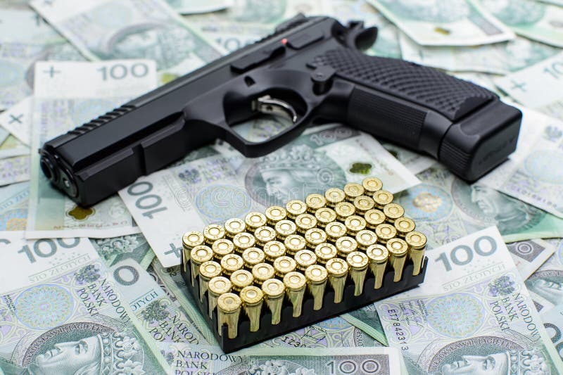 Fire Arm and Ammunition on Money Stock Photo - Image of financial, gold ...