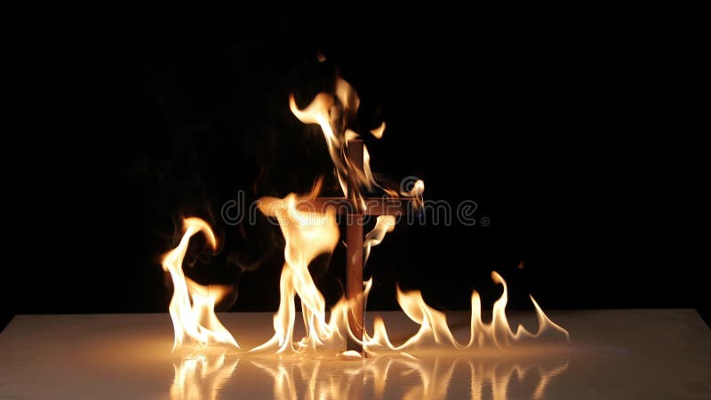 Burning cross falling down stock footage. Video of doom - 246939818