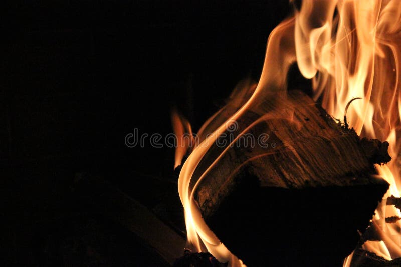 Fire around a log stock image. Image of campfire, wood - 168317465