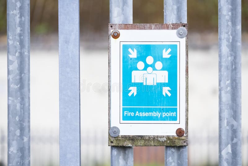 Fire Assembly Point Blue Sign on Fence Stock Image - Image of engine ...
