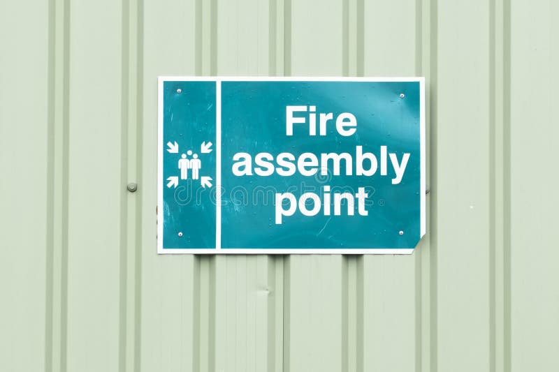 Fire Assembly Point Sign on Green Container Construction Site Stock ...