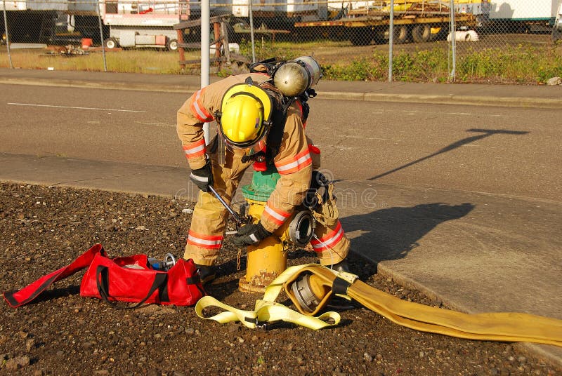 Fire Attack stock photo. Image of adult, road, pipe, equipment - 46352712