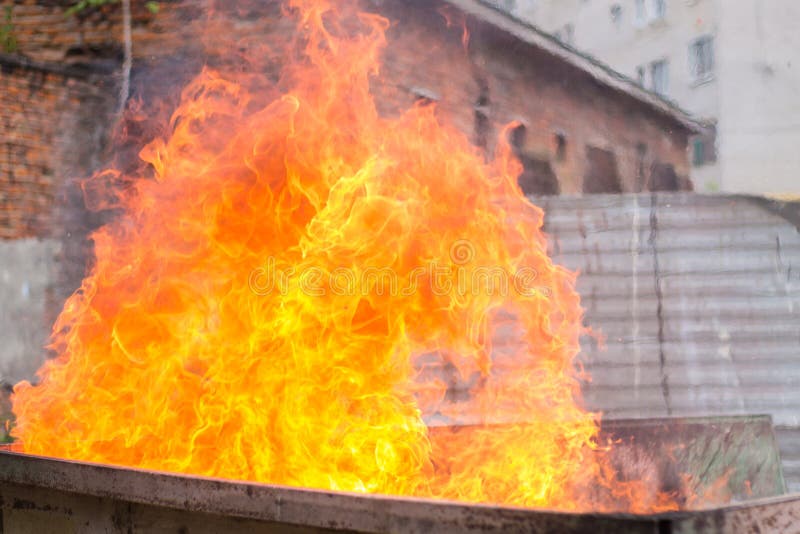 Fire on the Background of a Brick Wall Stock Image - Image of fired ...