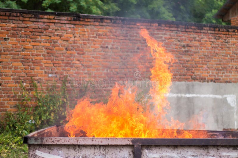 Fire on the Background of a Brick Wall Stock Photo - Image of exterior ...