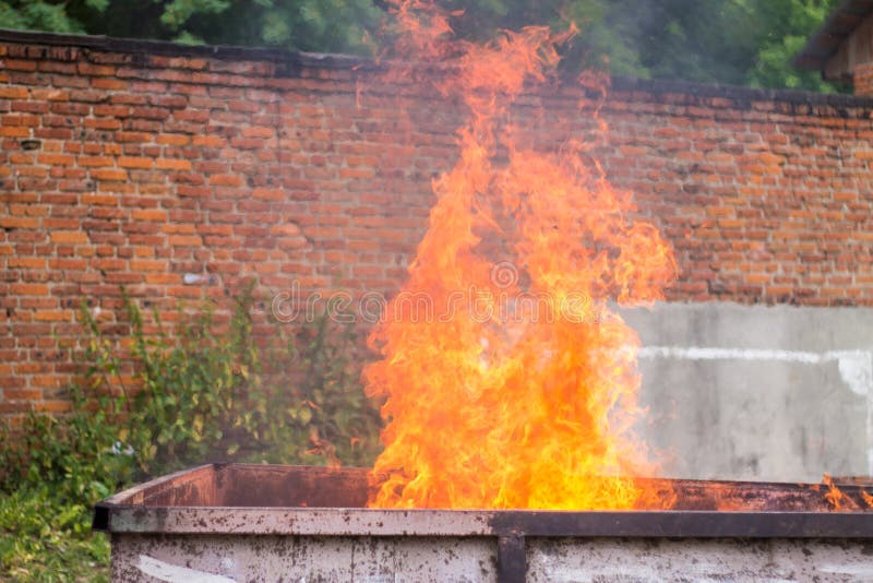 Fire on the Background of a Brick Wall Stock Photo - Image of backdrop ...