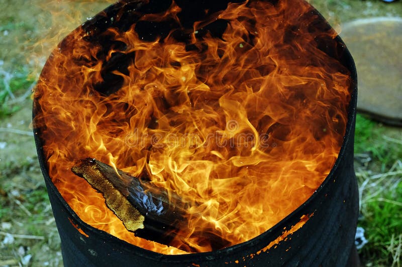Fire in a barrel stock photo. Image of design, coals - 94325236