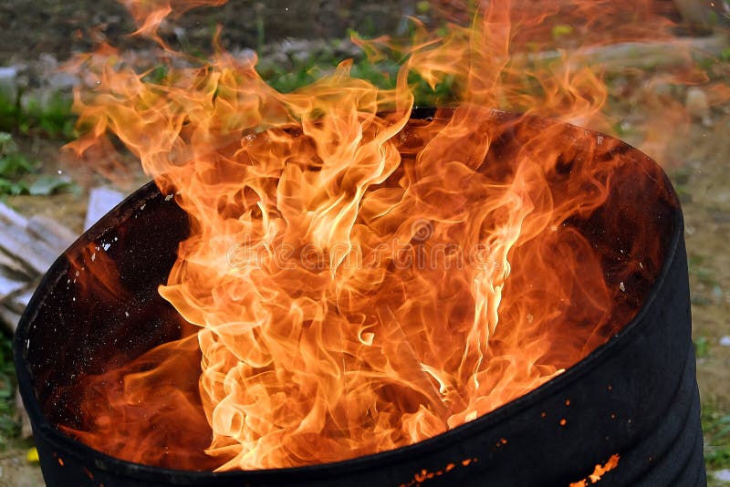 Fire in a barrel stock image. Image of flame, fire, inferno - 94615347