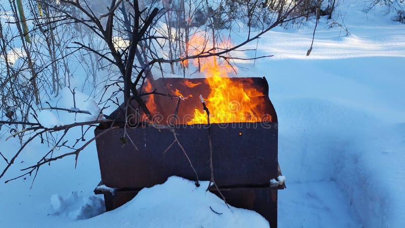 Recycling. Burning Garbage in an Iron Container. Fire Stock Footage ...