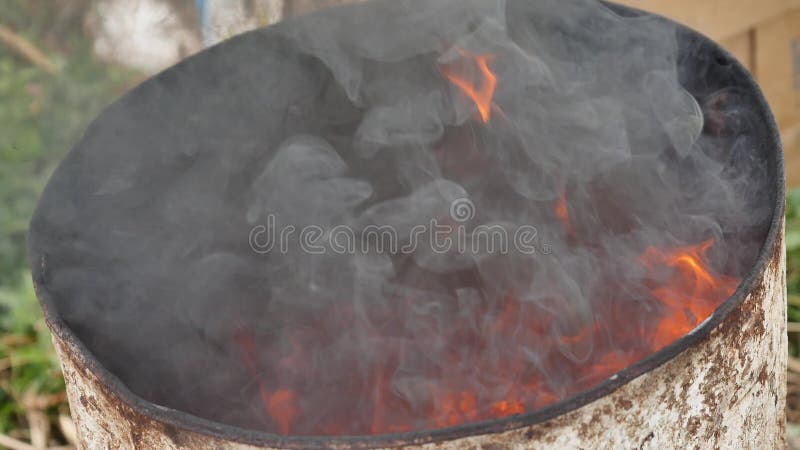 Fire in Barrels Oil Tank stock image. Image of pollute - 101106589