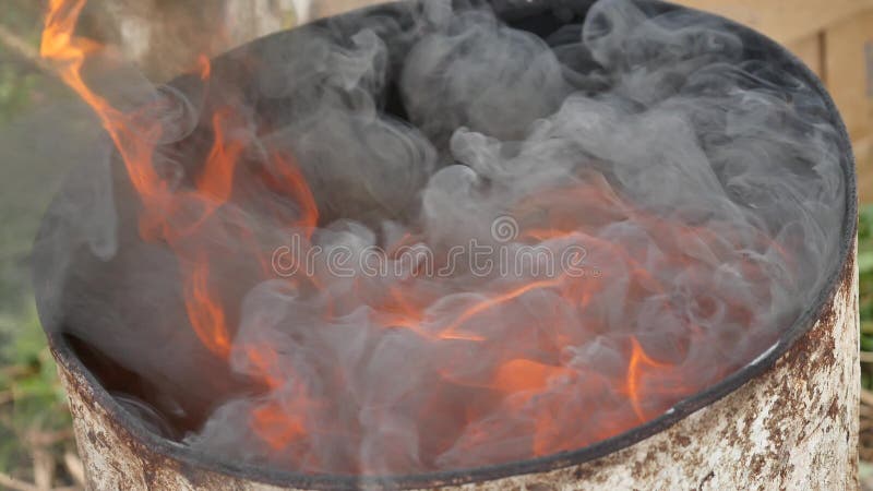 Fire in Barrels Oil Tank stock image. Image of pollution - 101107345