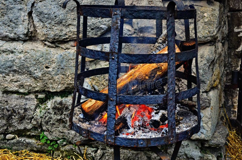 Fire in a fire basket stock image. Image of flames, open - 162581507