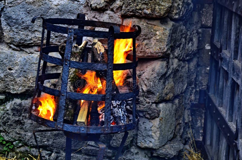 Fire in a fire basket stock photo. Image of campfire - 162581684
