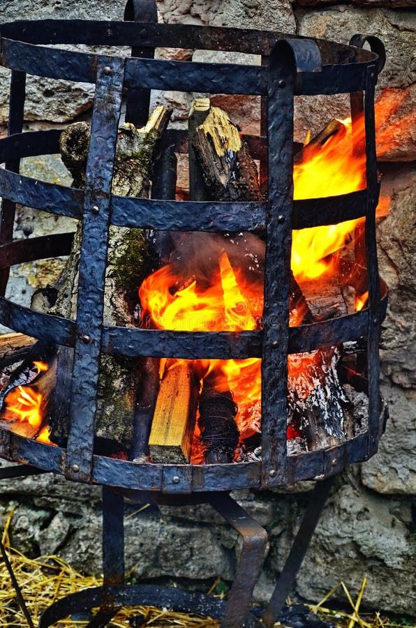 Fire in a fire basket stock image. Image of inferno - 162581889