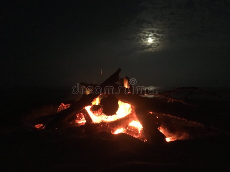 Fire on Beach during Full Moon Rising on Kauai Island, Hawaii. Stock ...