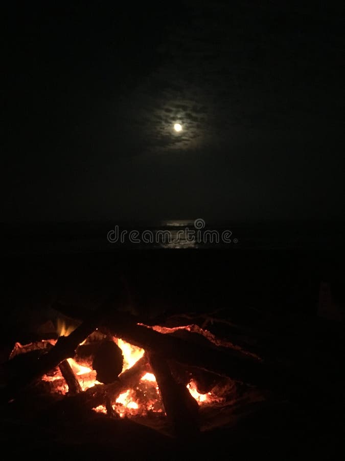Fire on Beach during Full Moon Rising on Kauai Island, Hawaii. Stock ...