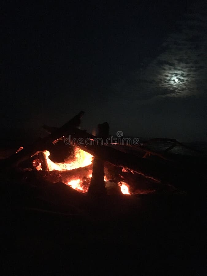 Fire on Beach during Full Moon Rising on Kauai Island, Hawaii. Stock ...