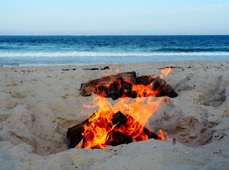 Fire on the Beach in the Sand Stock Image - Image of jersey, sunset ...