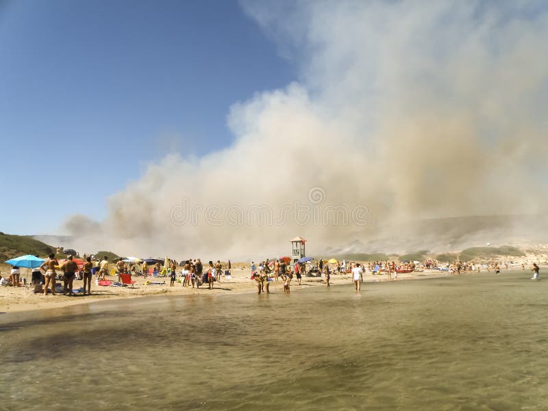 Fire on the beach editorial photo. Image of plume, helicopter - 37064146
