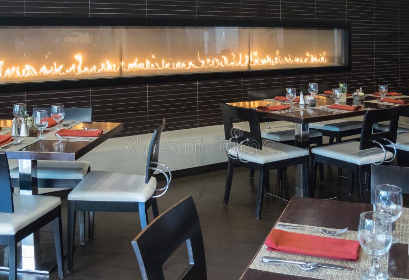 Restaurant Interior with Fire Feature Stock Image - Image of colors ...