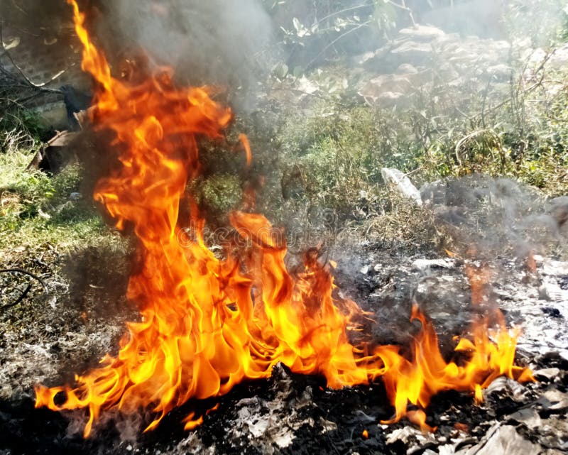 Fire Blaze and Flame Texture Background. Fire with Black Smoke Dust and ...