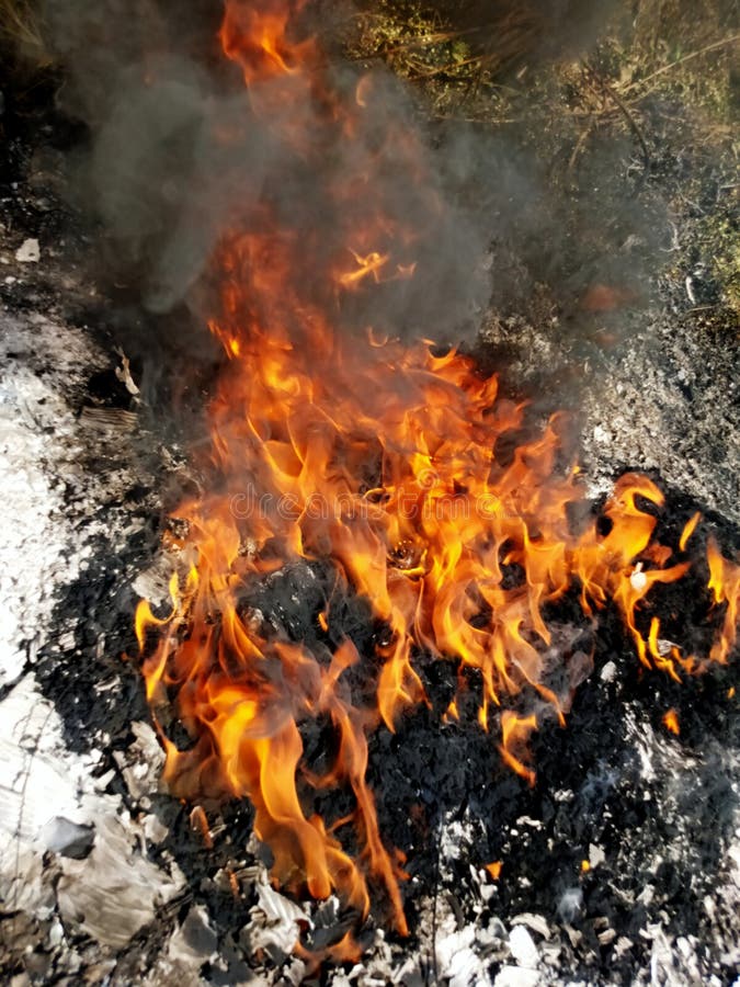 Fire Blaze and Flame Texture Background. Fire with Black Smoke Dust and ...