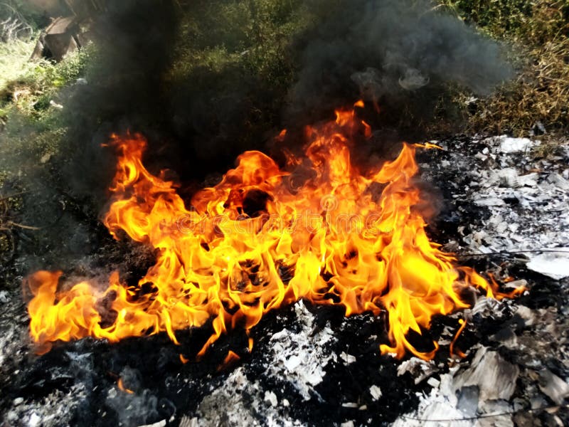 Fire Blaze and Flame Texture Background. Fire with Black Smoke Dust and ...