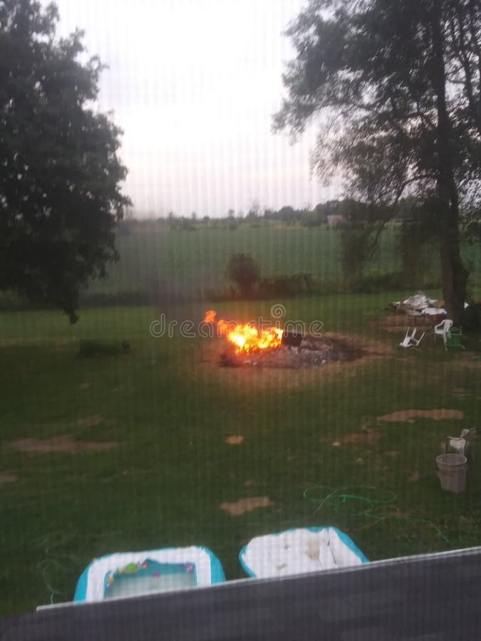 Fire Blowing in the Wind in Thee Backyard Stock Image - Image of windy ...