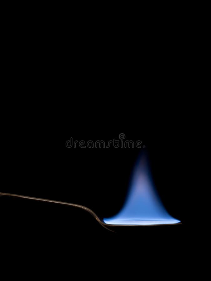 Fire. Blue Flame on Spoon, Black Background. Stock Photo - Image of ...