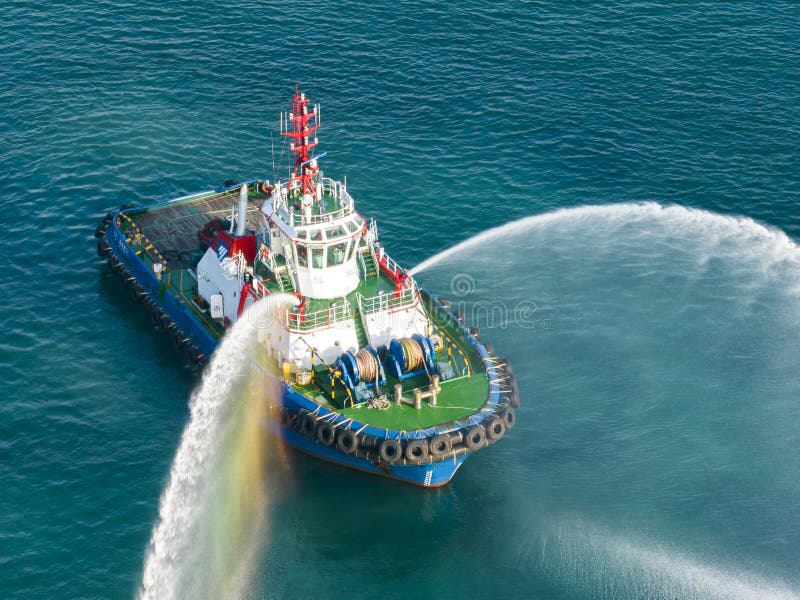 A Fire Boat Spray Water in the Ocean Stock Image - Image of spray ...