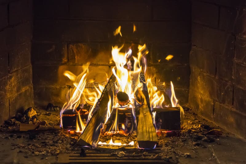 Fire in brick fireplace stock image. Image of campfire - 105813511