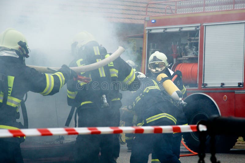 Fire brigade in action stock image. Image of tank, firetruck - 43842161