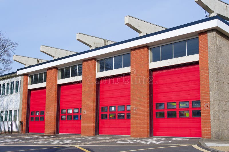 Fire Brigade Station Building with Red Roller Shutter Doors Stock Image ...