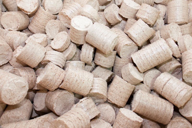 Fire Briquettes for Heating: Stacked Firewood Packed in Plastic Stock ...