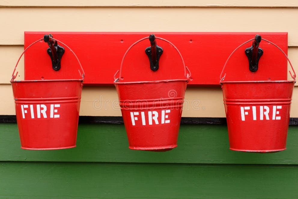 Fire Buckets Hanging on a Wall Stock Photo - Image of truck ...