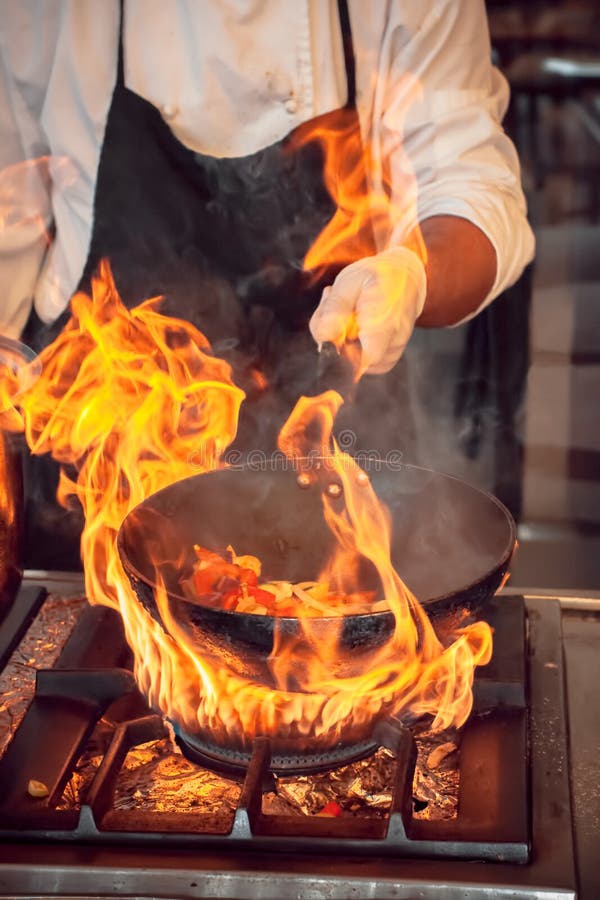 Fire Burn, Cooking on Iron Pan Stock Image - Image of professional ...