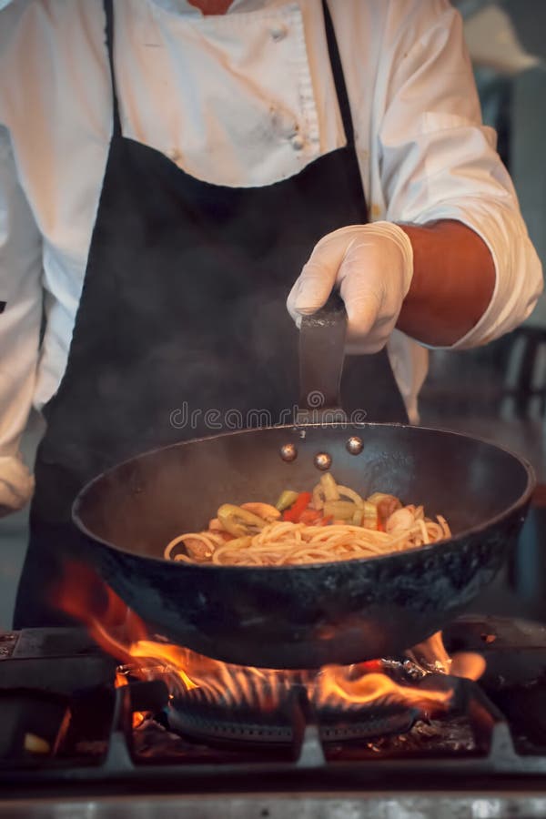 Fire Burn, Cooking on Iron Pan Stock Photo - Image of preparing, dinner ...