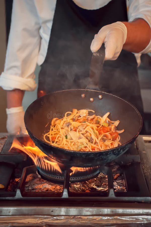 Fire Burn, Cooking on Iron Pan Stock Image - Image of warm, roast: 85695117